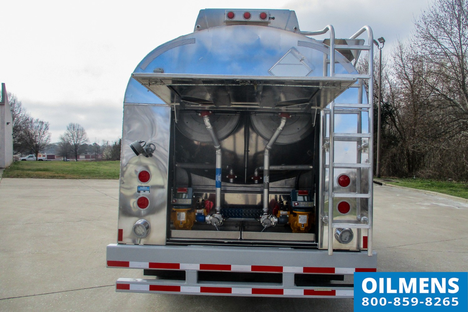 View of Rear Equipment Door with Inverted Reels on Both Sides and Hose ...